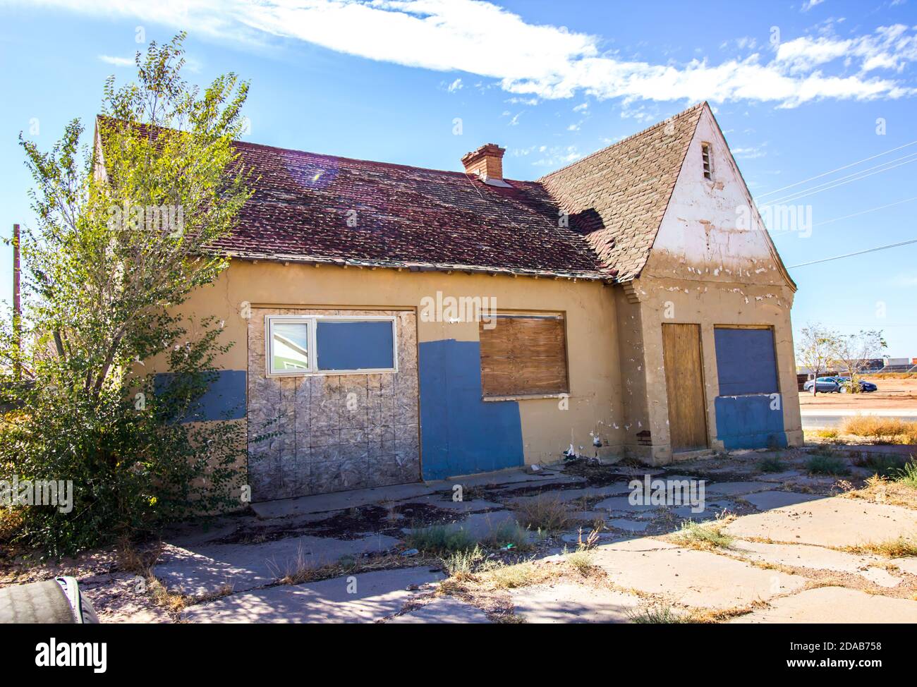 Old Abandoned One Level Home With Boarded Up Windows & Door Stock Photo ...