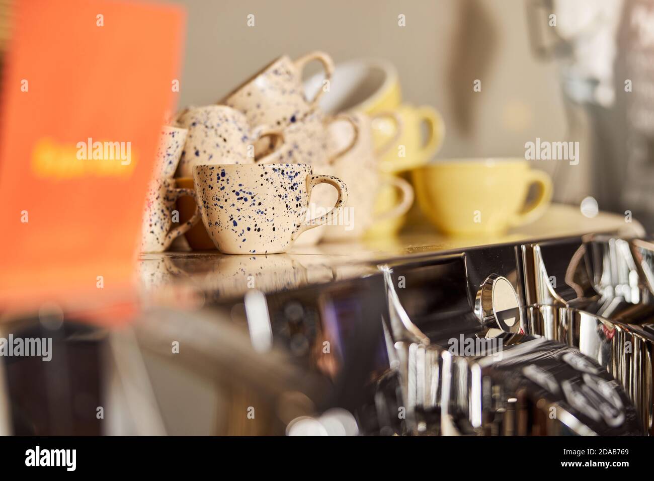 Colorful lovely cups in the modern coffee house Stock Photo - Alamy
