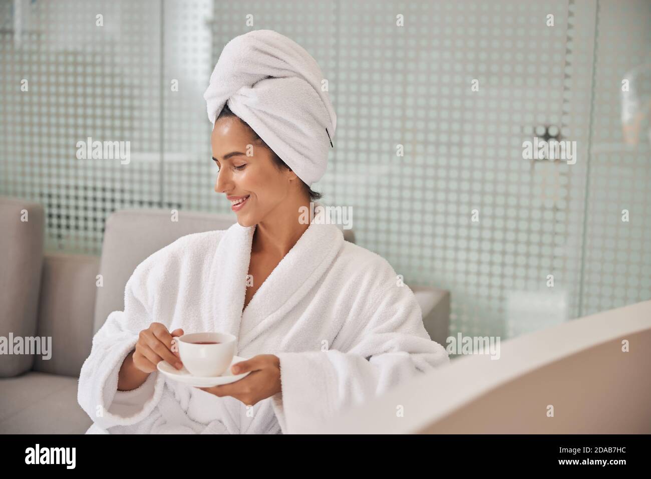Client ready to make a sip of tea Stock Photo - Alamy