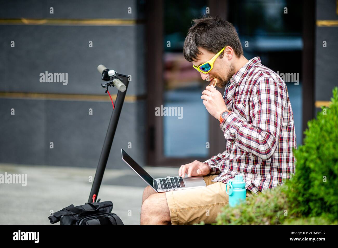 Busy person is hurry, he has no time, he going to eat outdoors. The guy ...