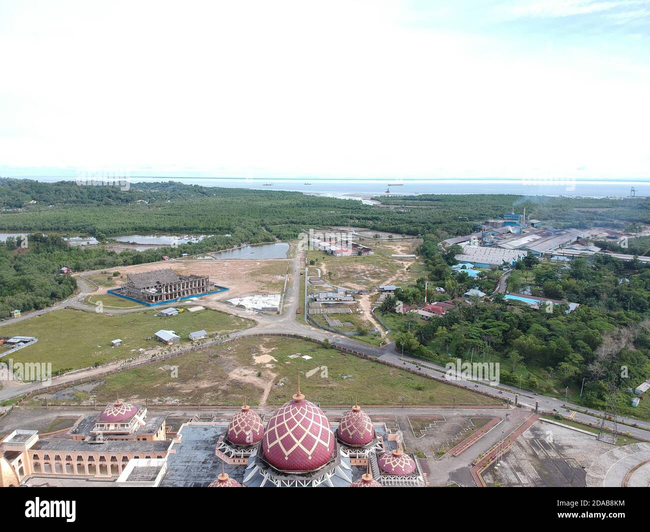 Aerial view of housing, forest, river, sea and island Stock Photo - Alamy