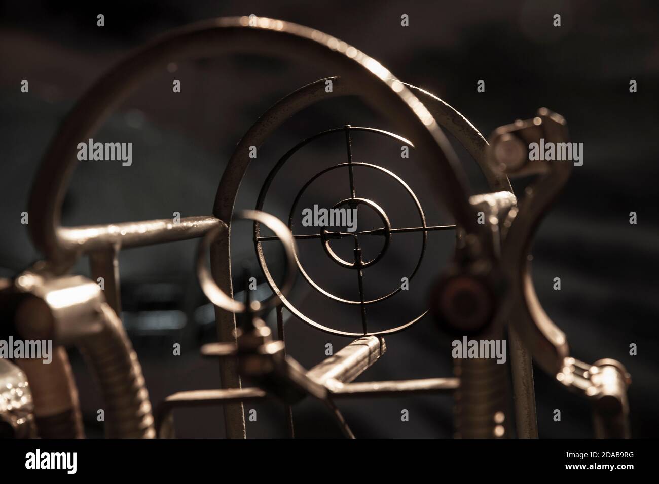Dark anti-aircraft gun sight, close up photo with selective soft focus ...