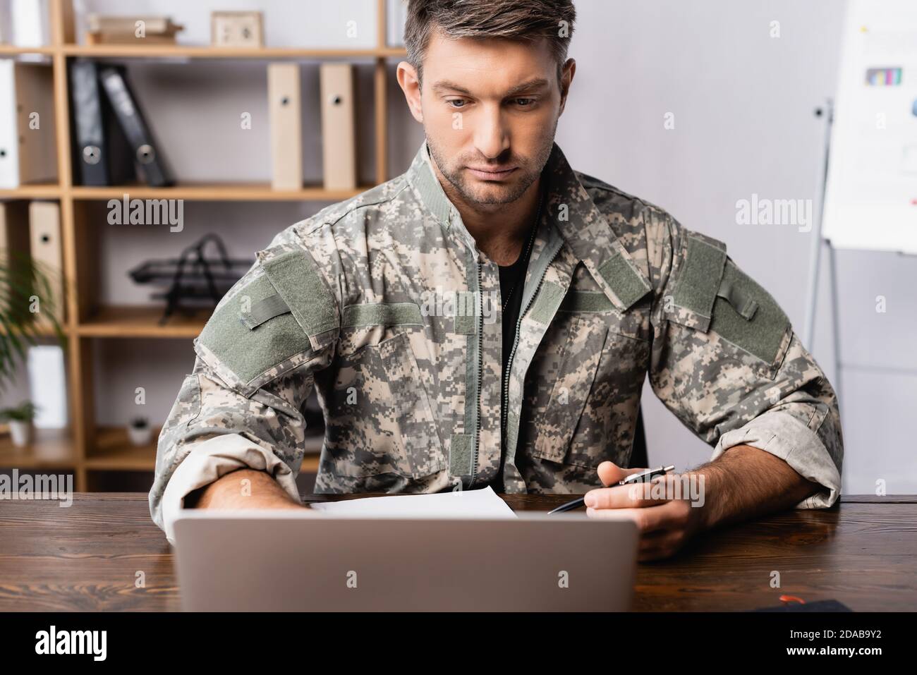 Sitting military army soldier technology communication hi-res stock ...