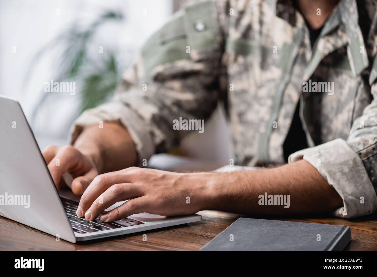 Army man laptop hi-res stock photography and images - Alamy