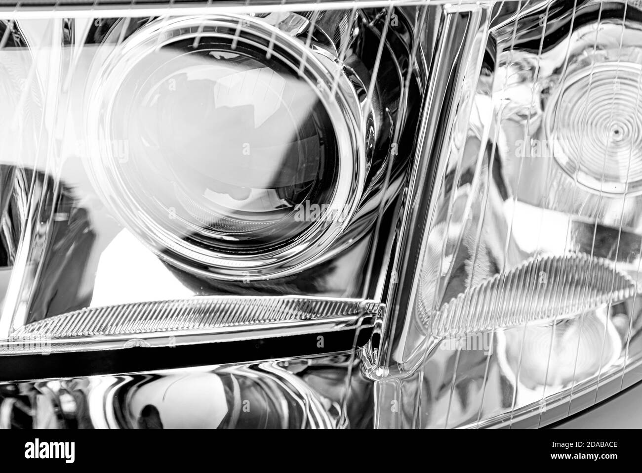 Car headlight at close range. New car headlight Stock Photo - Alamy