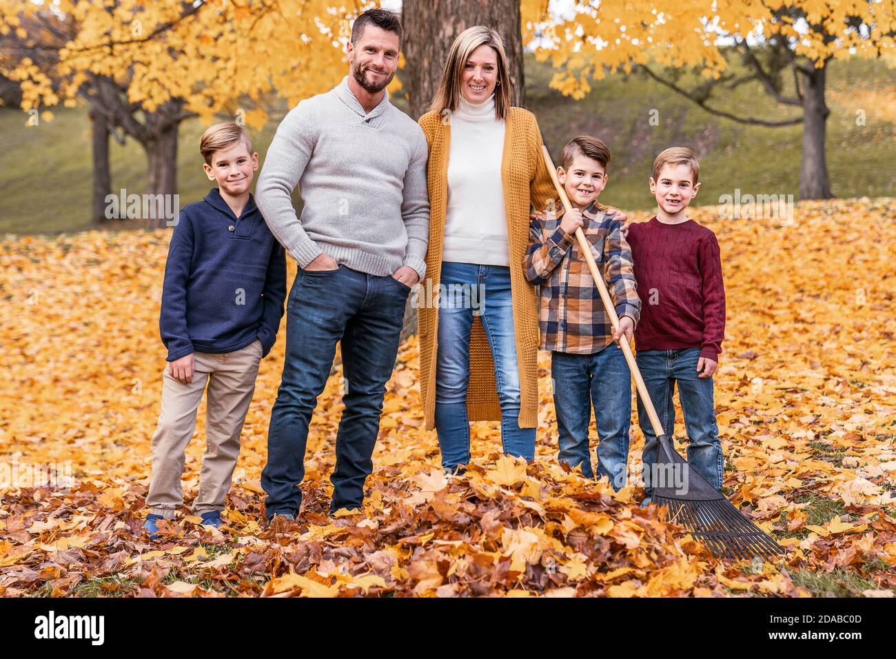 Family Group having fun Outdoors In Autumn Landscape Stock Photo - Alamy
