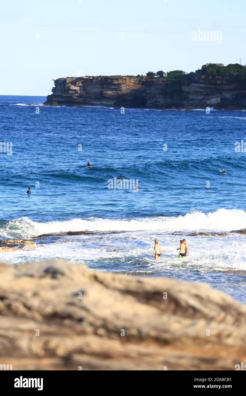 Bondi beach with wave and rocks Stock Photo - Alamy