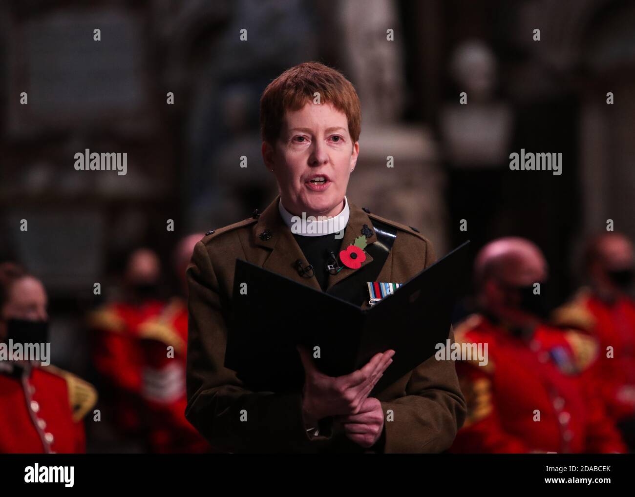 The Reverend Nicola Frail CF, Senior Chaplain, reads from the memoirs ...