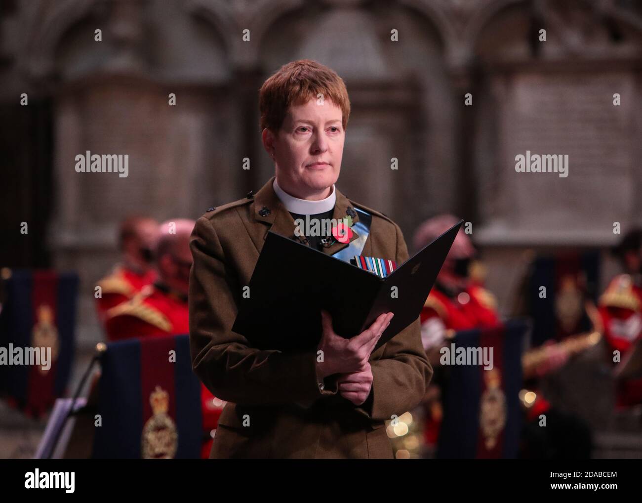The Reverend Nicola Frail CF, Senior Chaplain, reads from the memoirs ...