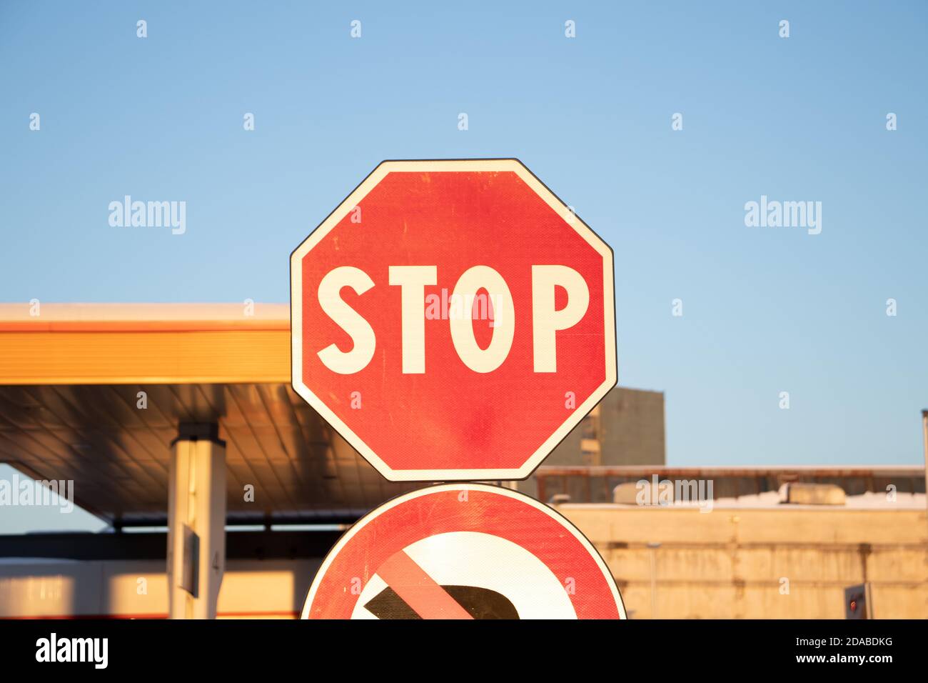 Stop sign, blue sky in the background Stock Photo - Alamy