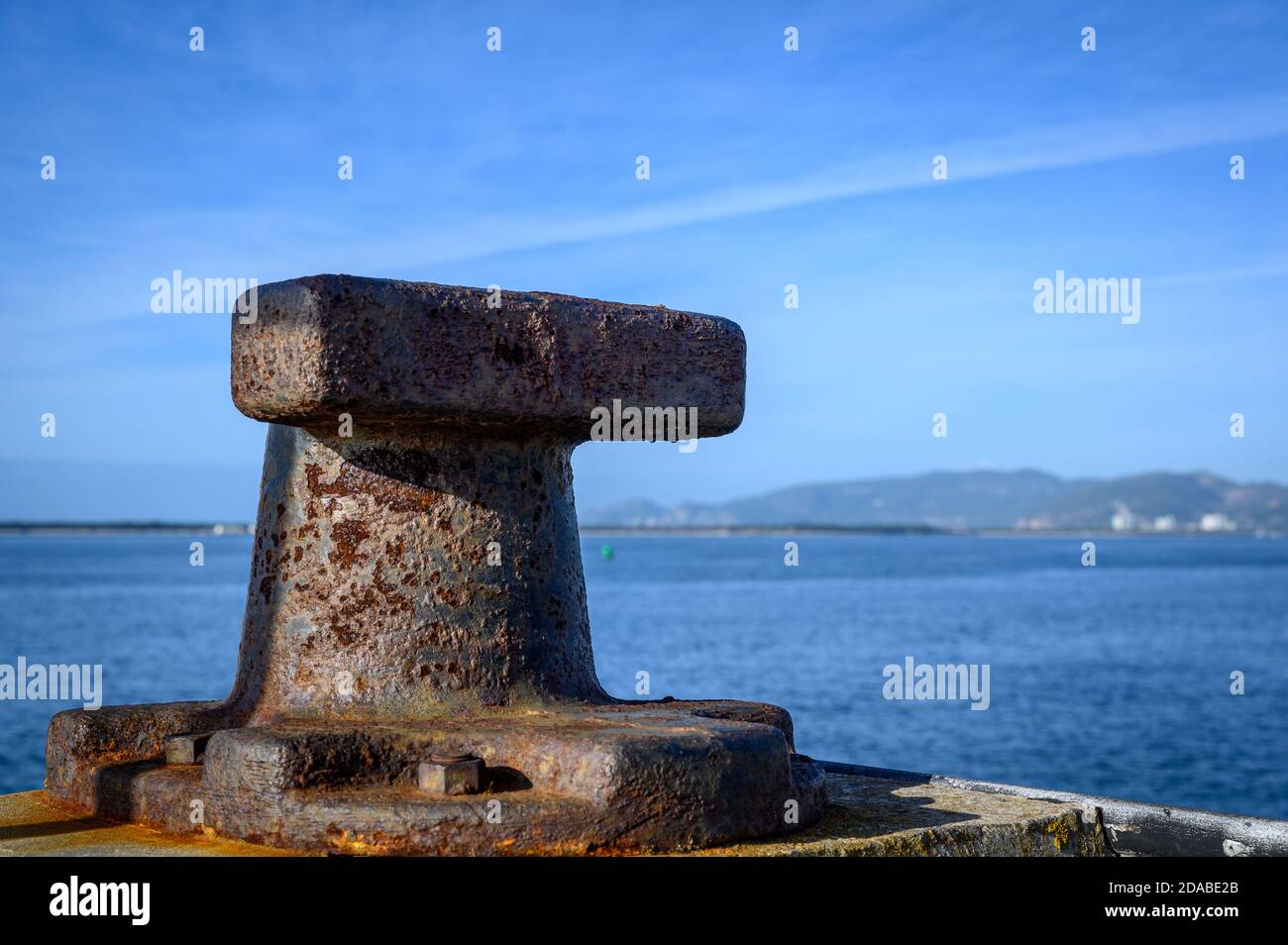 View of rusty dock bollard in the pier Stock Photo - Alamy
