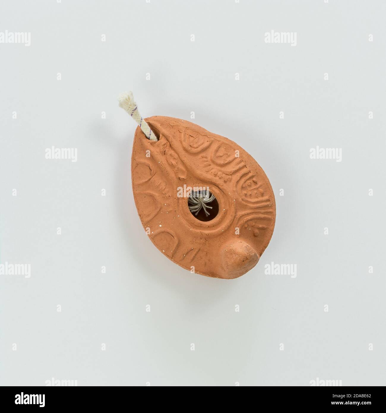 Top view of old mud lamp isolated on white background Stock Photo - Alamy