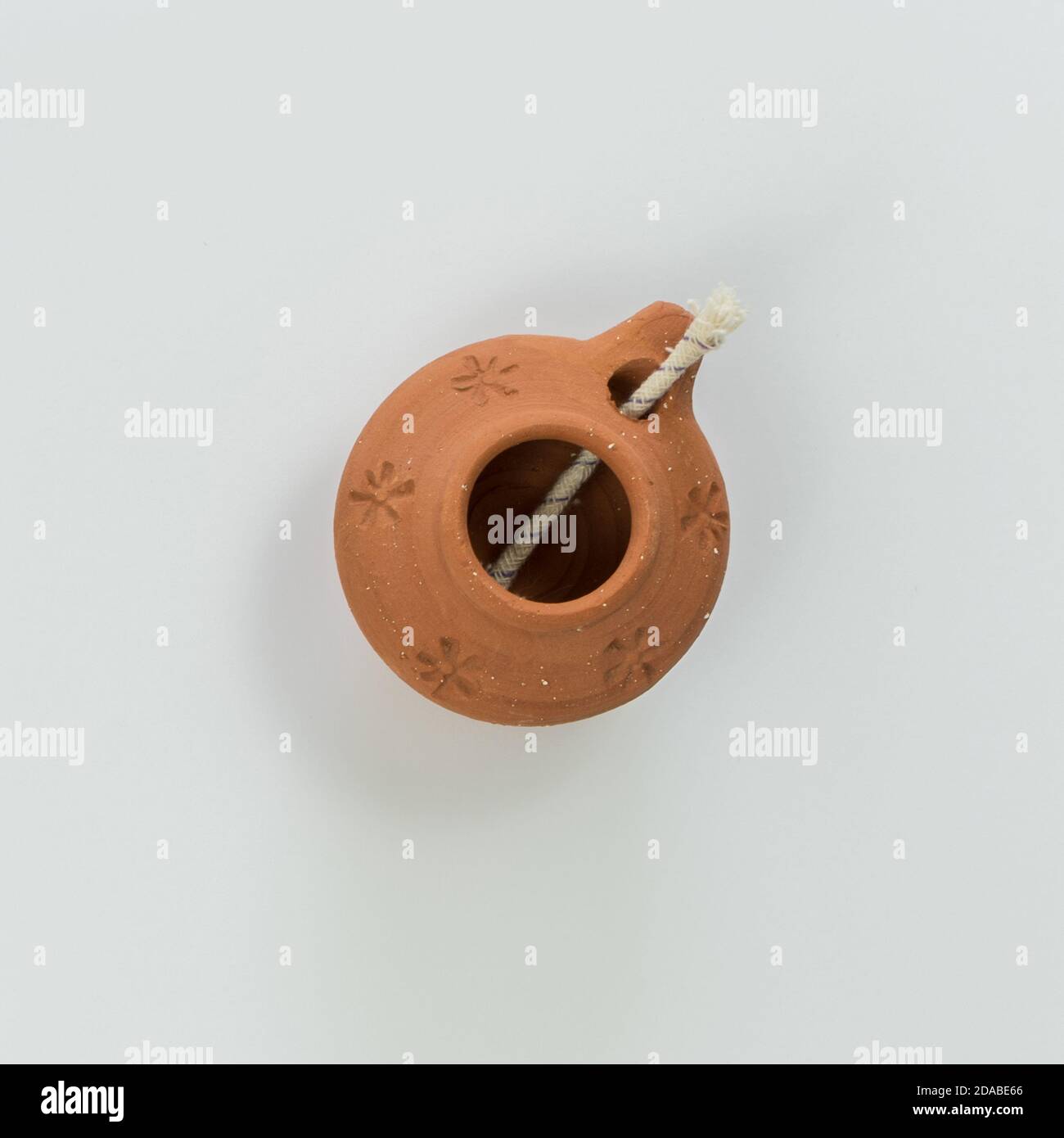 Top view of old mud lamp isolated on white background Stock Photo - Alamy