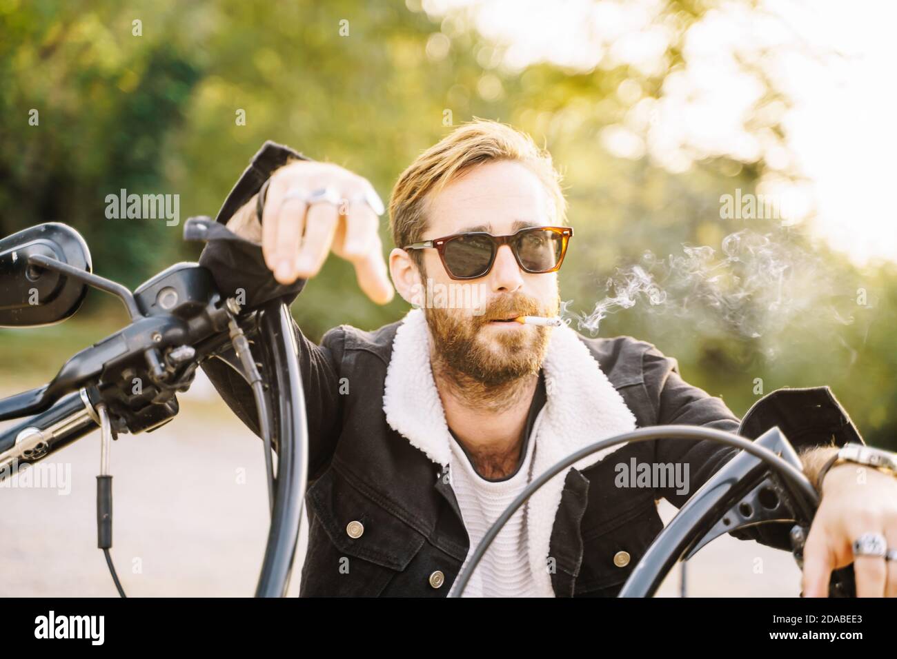 Vintage portrait of a man with rude expression wearing sunglasses and ...