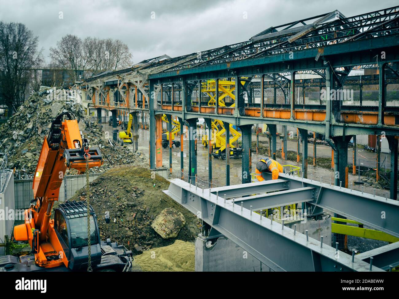 Metal structure of ancient factory partially demolished Stock Photo - Alamy