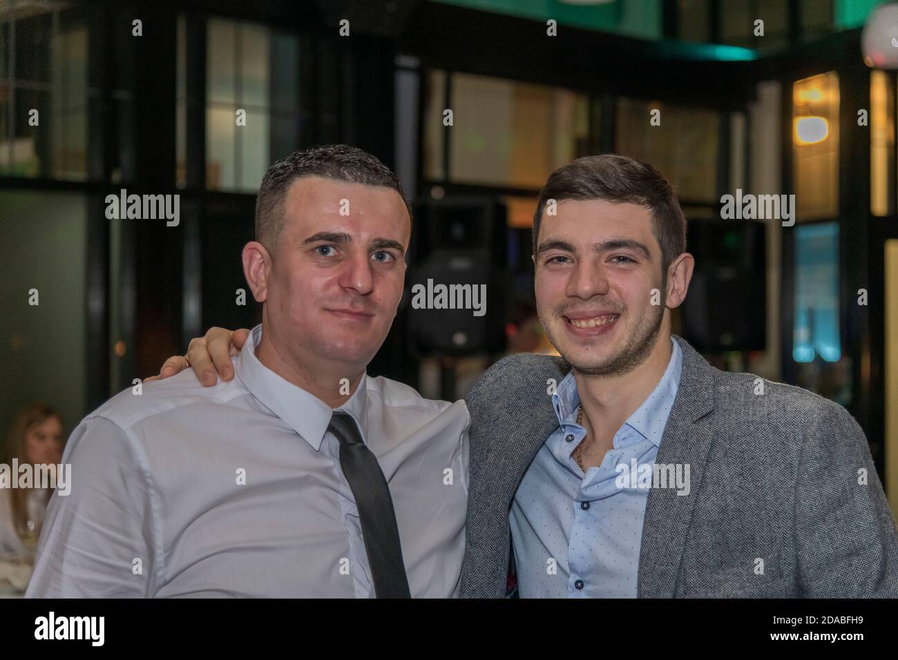 Two young cheerful friends having fun together posing for camera, City ...