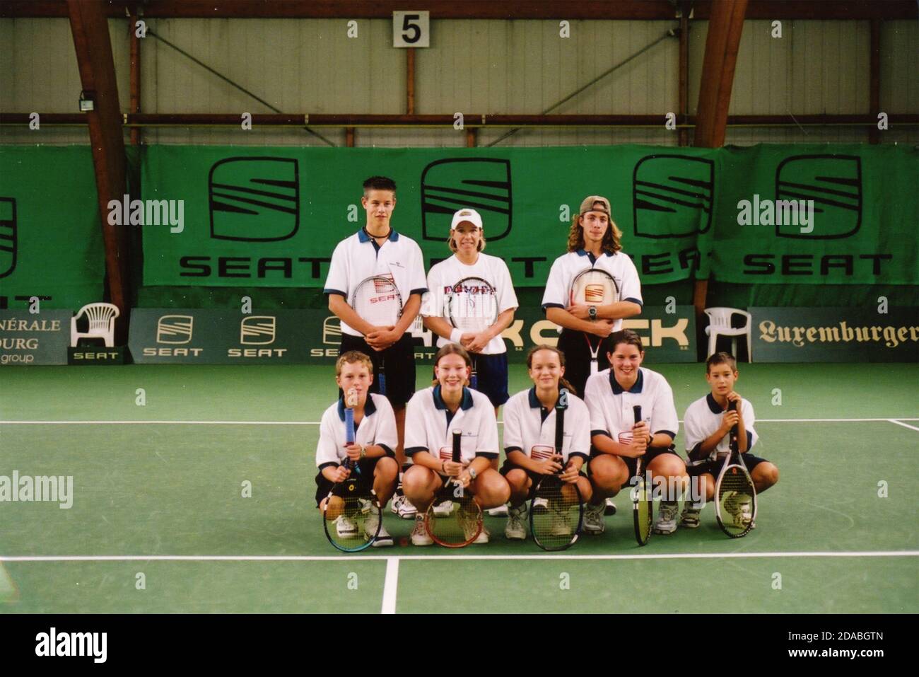 American tennis player Lisa Raymond with the ballboys, Luxembourg 2001 ...