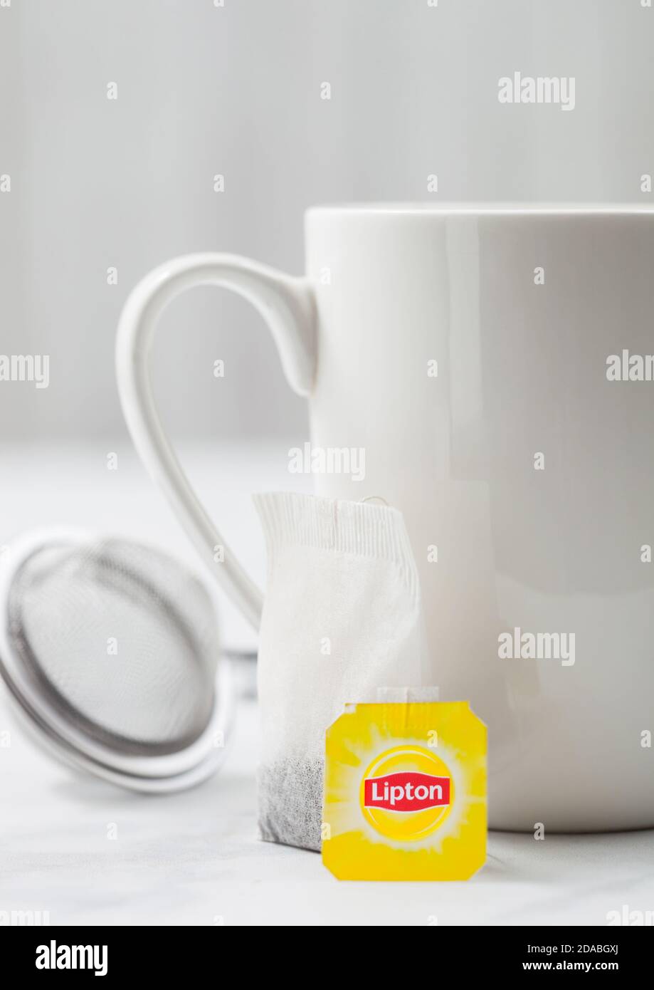 LONDON, UK - OCTOBER 21, 2020: Lipton yellow label tea bag next to ...