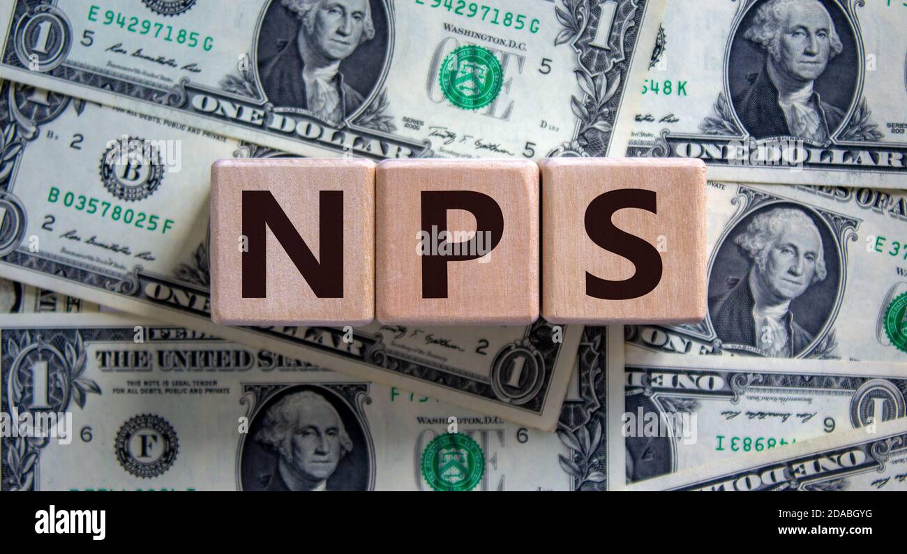 Wood cubes with acronym 'NPS' - 'net promoter score' on a beautiful ...