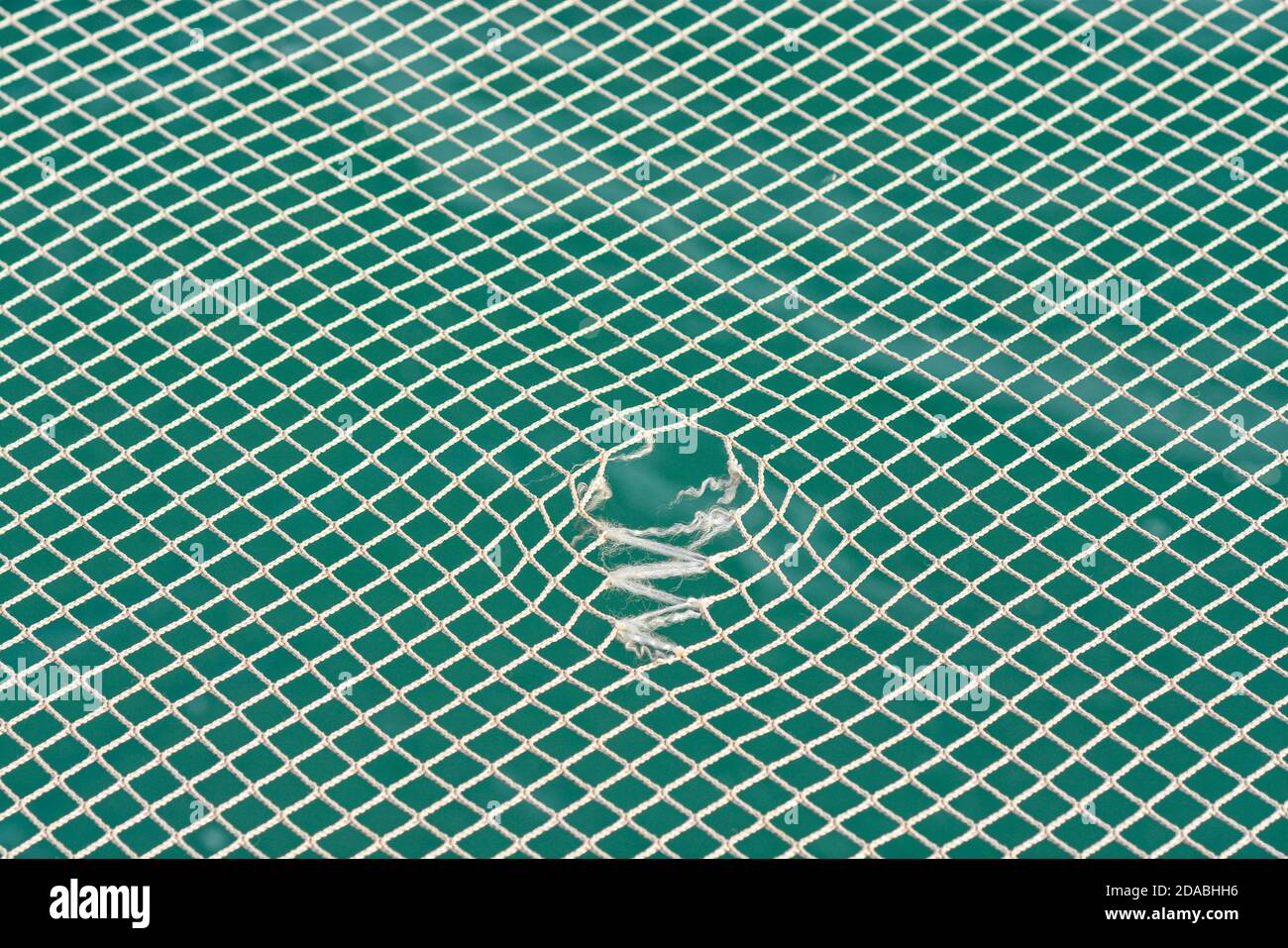 Torn soccer net hi-res stock photography and images - Alamy