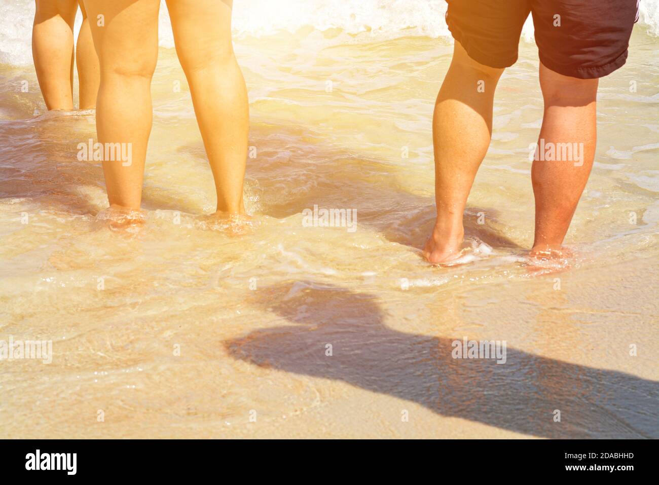 Man foot dipping to the sea Stock Photo - Alamy
