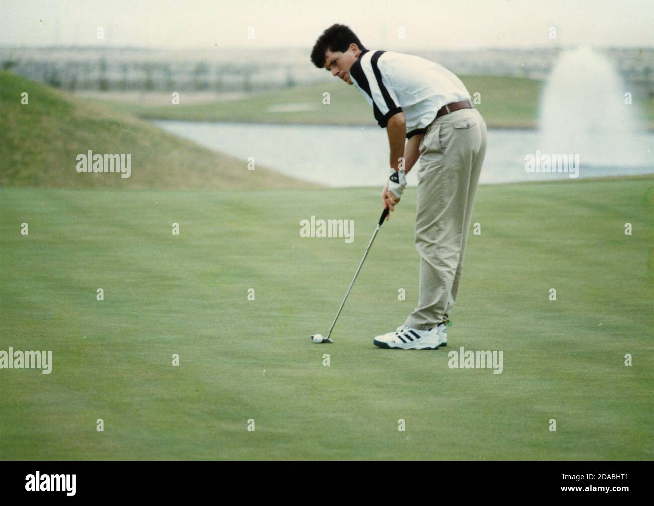 British tennis player Tim Henman playing golf, 1990s Stock Photo - Alamy