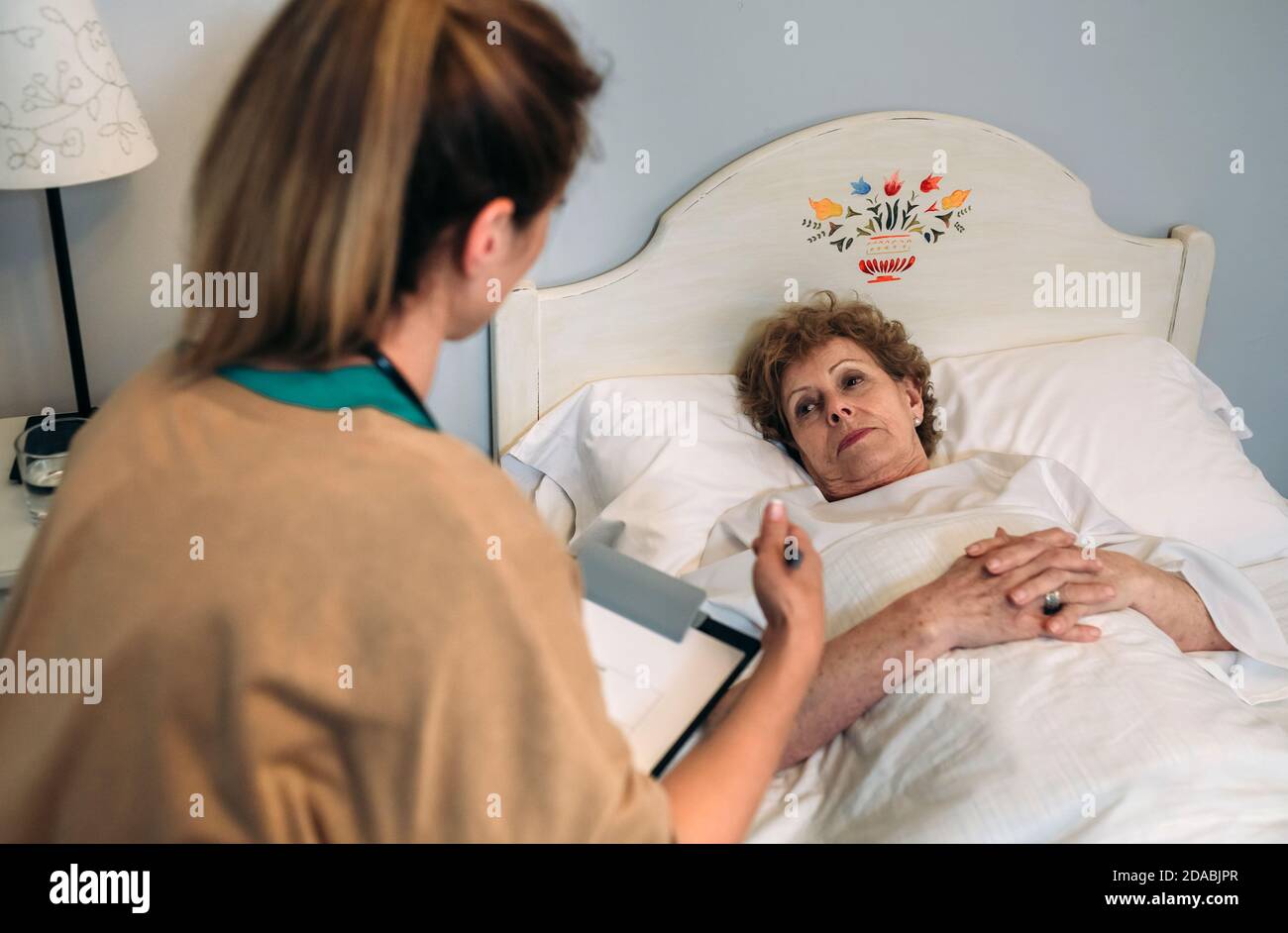 Female doctor explaining the treatment Stock Photo - Alamy