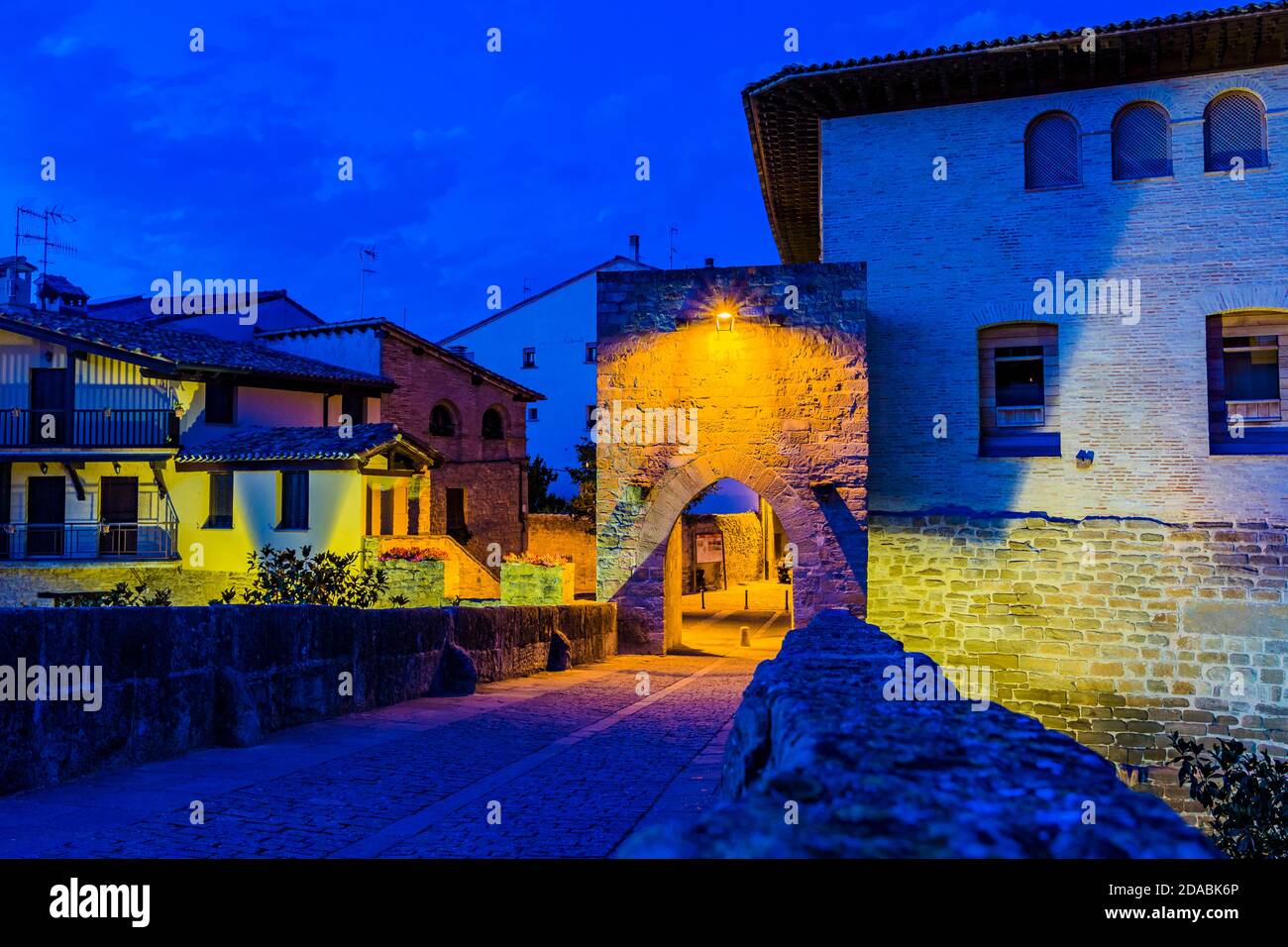 Entrance tower to the medieval bridge over the Arga river. French Way ...