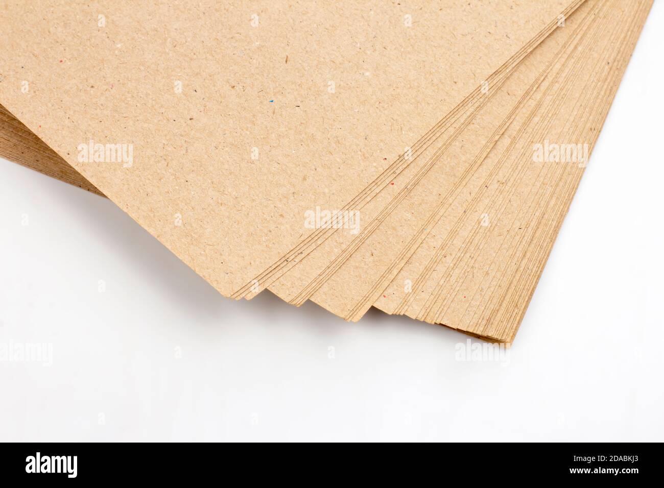bundle of plain paper on a white background Stock Photo - Alamy