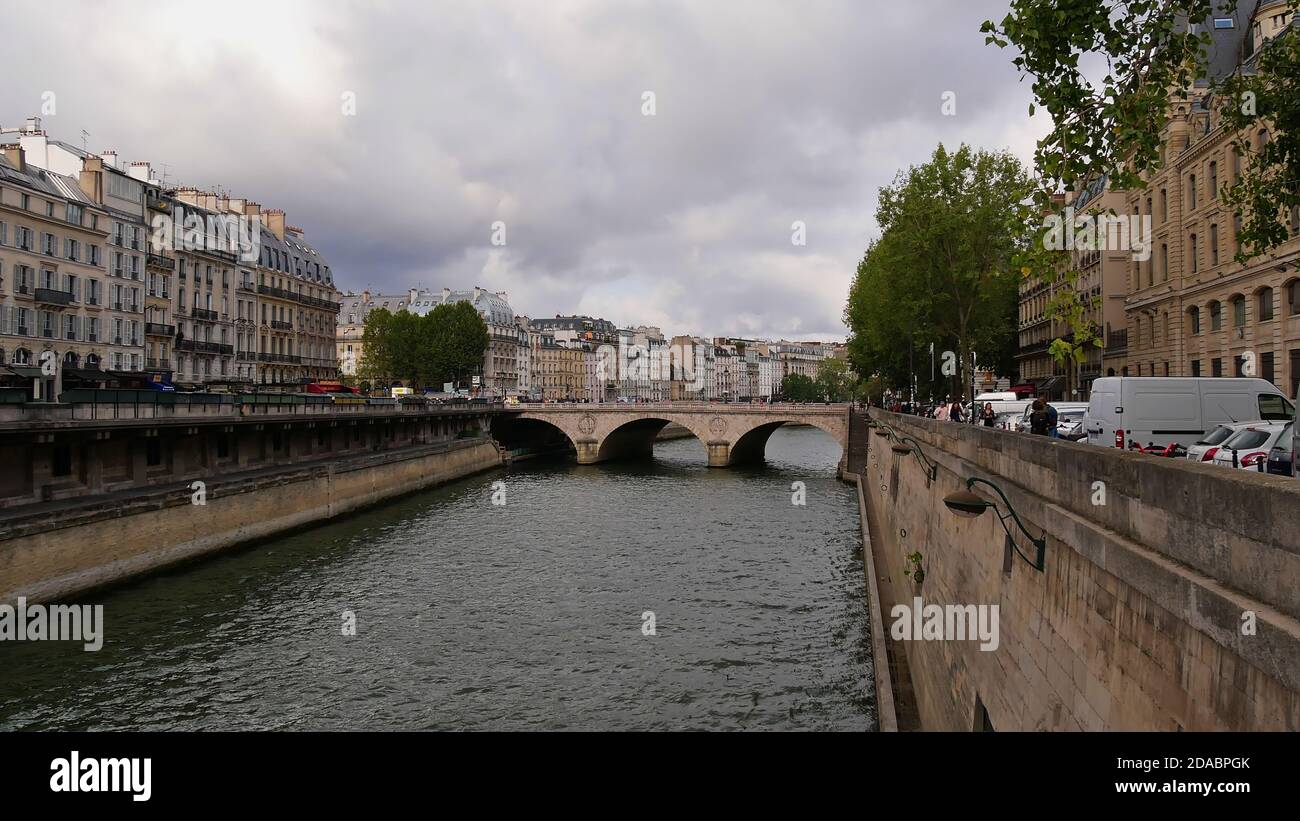 Paris, France - 09/07/2019: Seine river with historic bridge Pont Saint ...