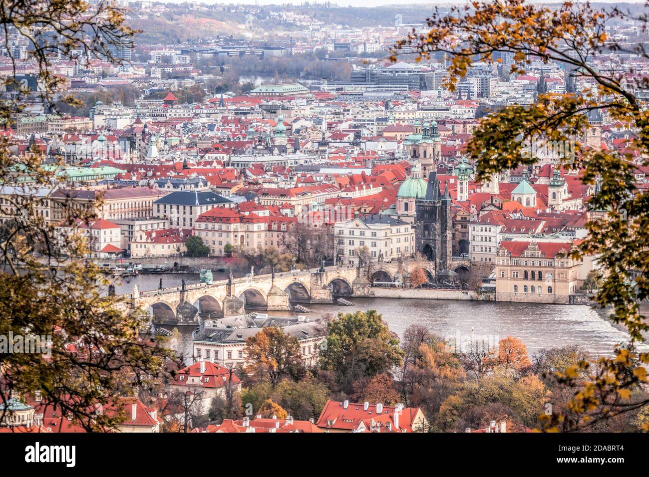 Charles bridge with autumn trees in Prague, Czech Republic Stock Photo ...