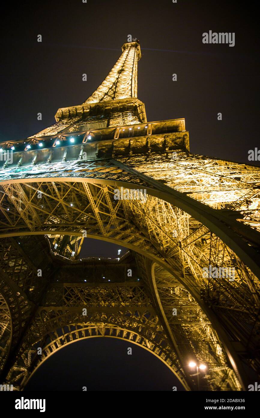 Eiffel Tower from bellow at night Stock Photo - Alamy