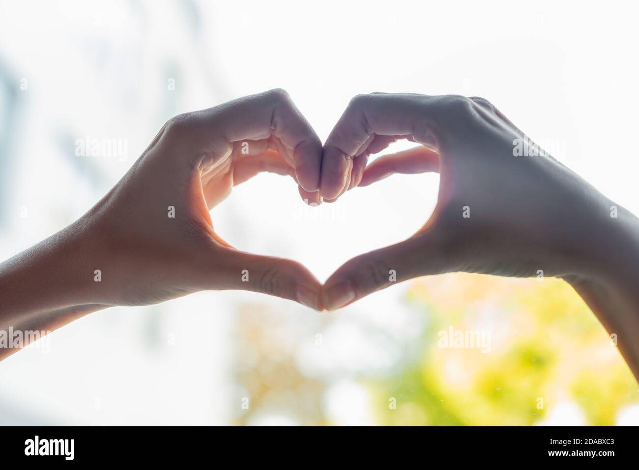 Heart shaped hands sign hi-res stock photography and images - Alamy
