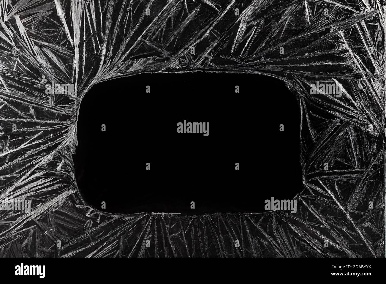 White freeze, ice crystal texture on black background. Overlay ...