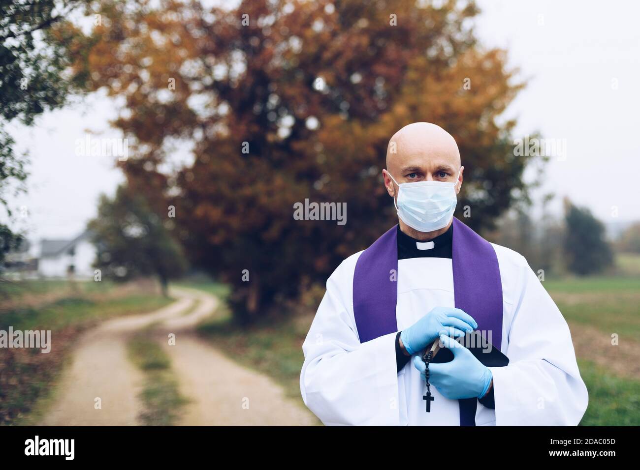 Pastoral visits during a pandemic in a small village Stock Photo - Alamy
