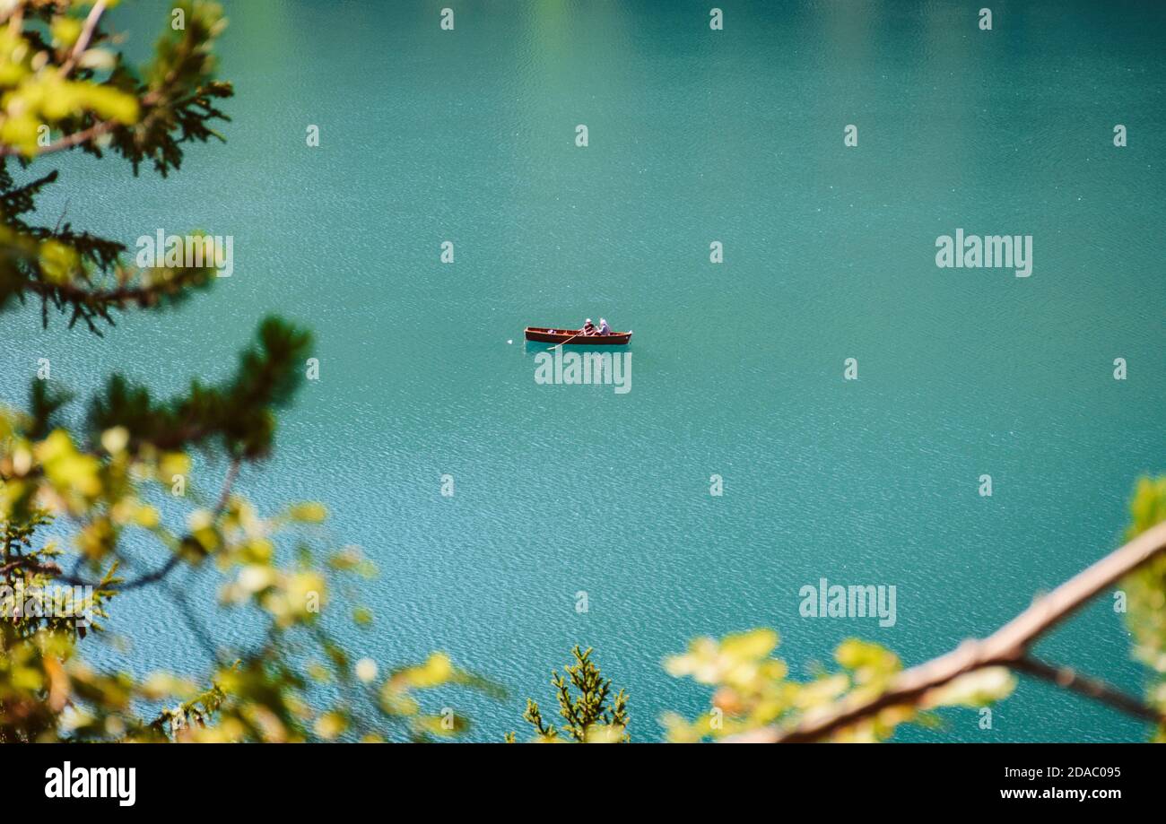 High angle shot of people rowing at the lake Stock Photo - Alamy