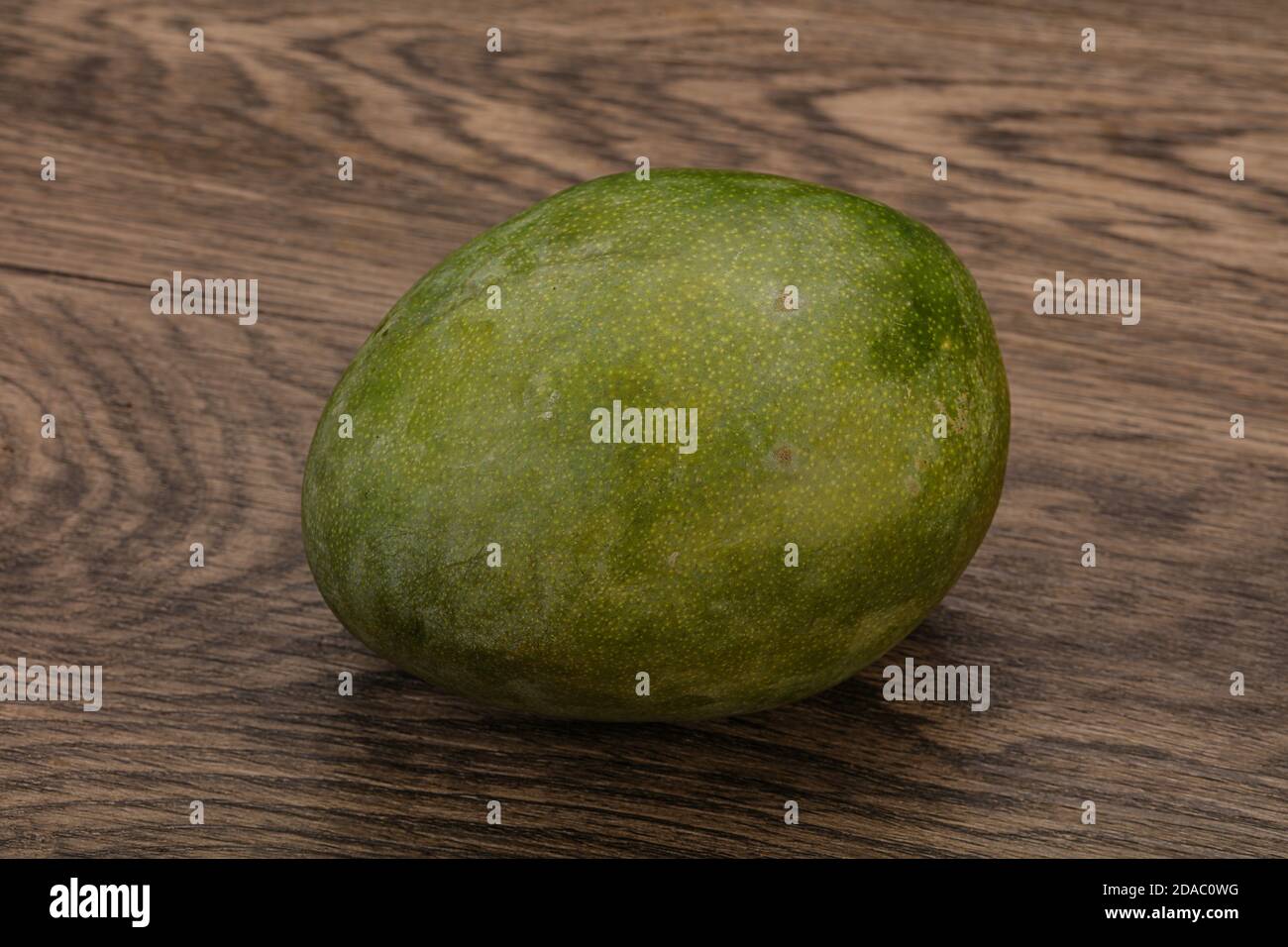 Tropical fruit - Green sweet tasty mango Stock Photo - Alamy