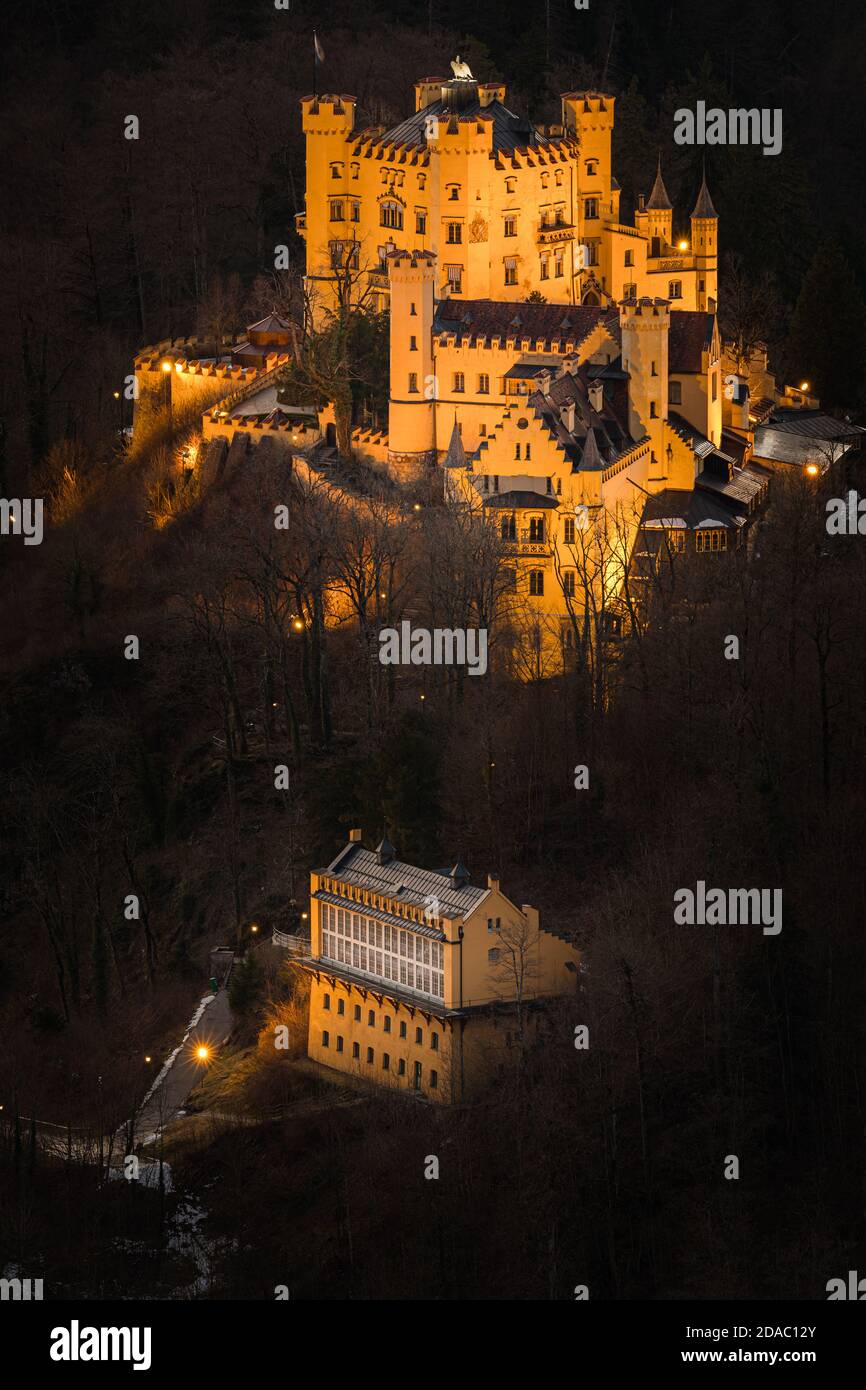 Hohenschwangau Castle at twilight, near Hohenschwangau, OstAllgau ...