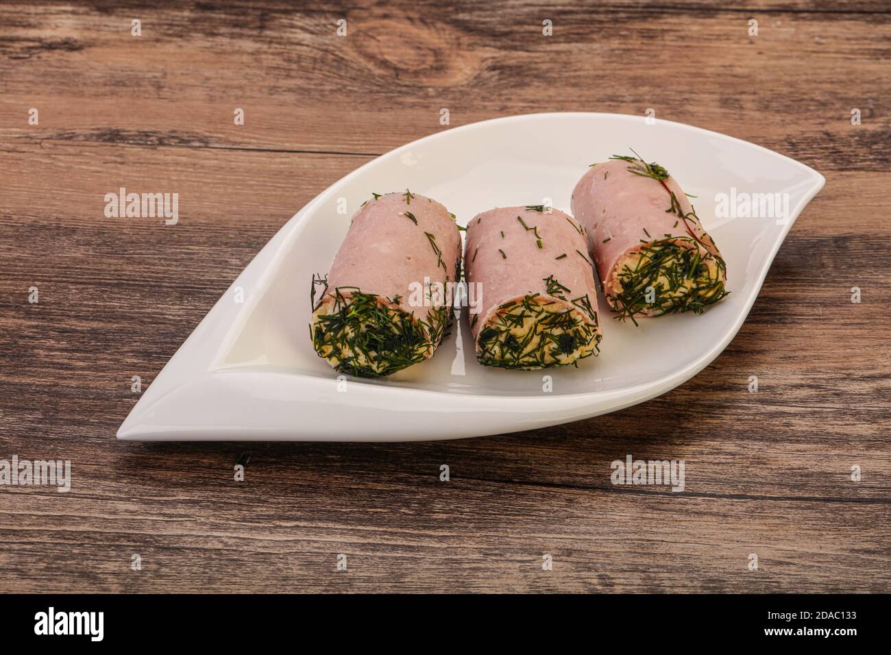 Ham roll snack with cheese and garlic Stock Photo - Alamy