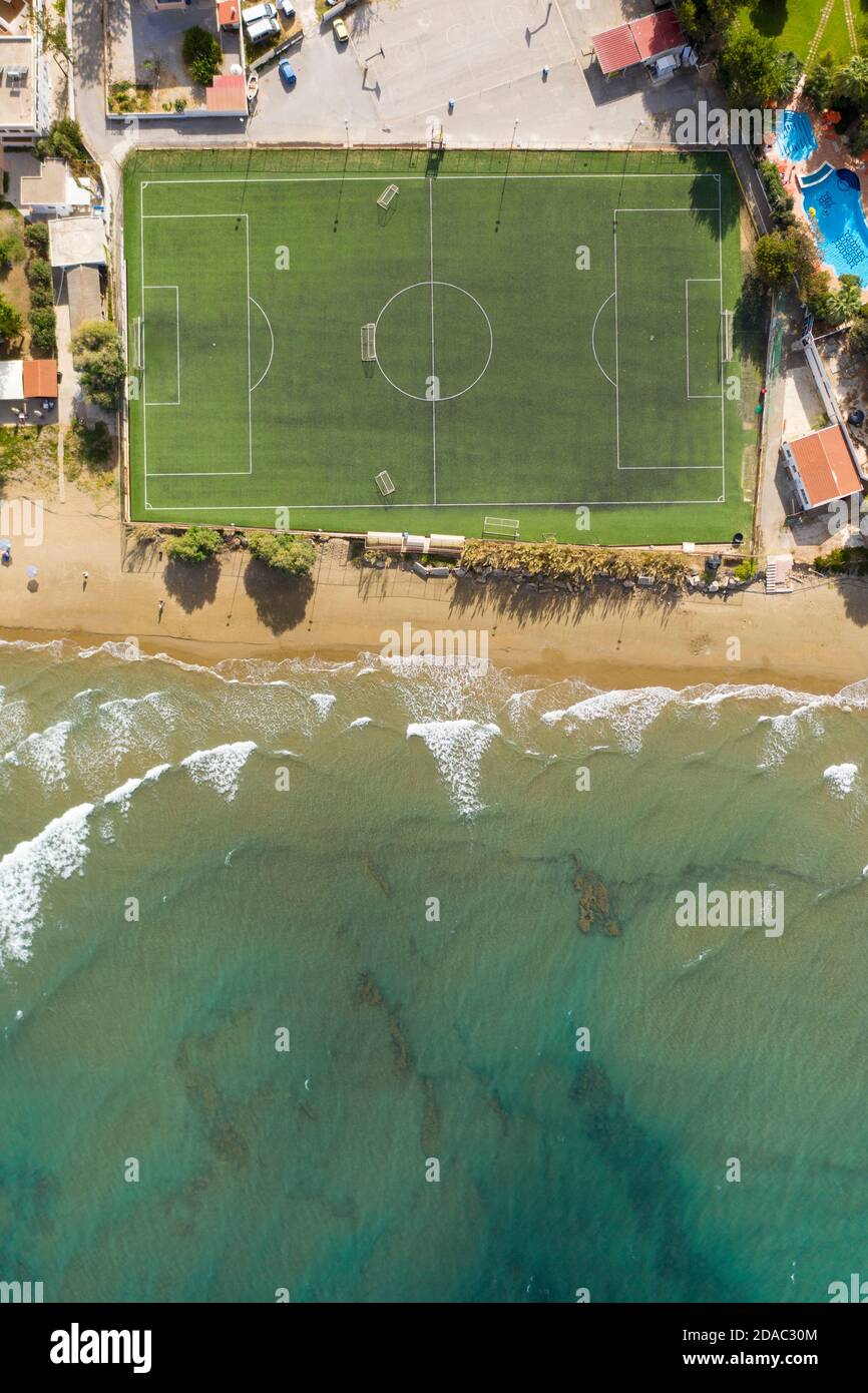 Aerial view of a seaside football pitch in Agia Marina, Chania, Crete ...