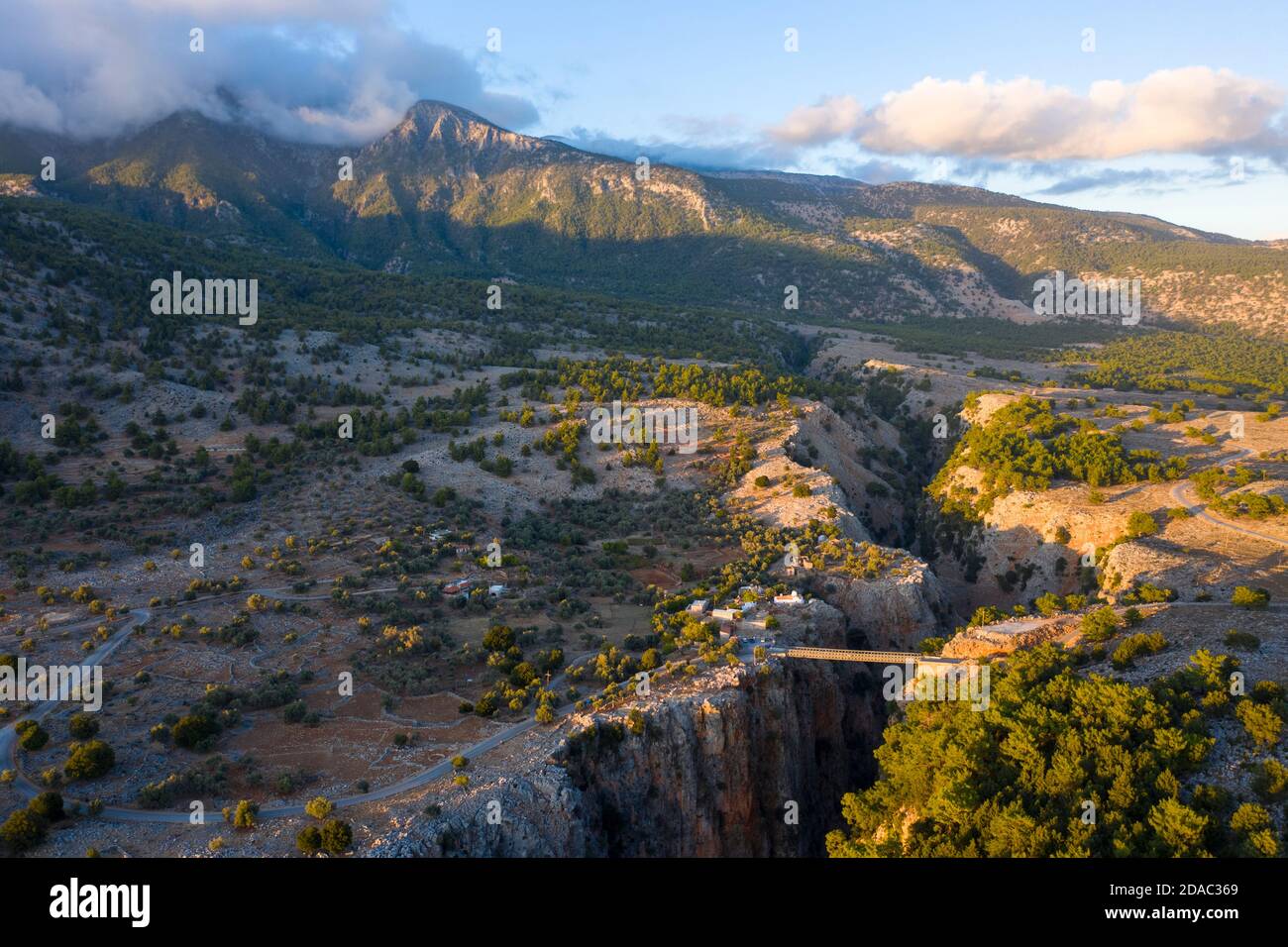 Aerial view over Aradena Gorge at sunset showing Aradena Bridge, Hora ...