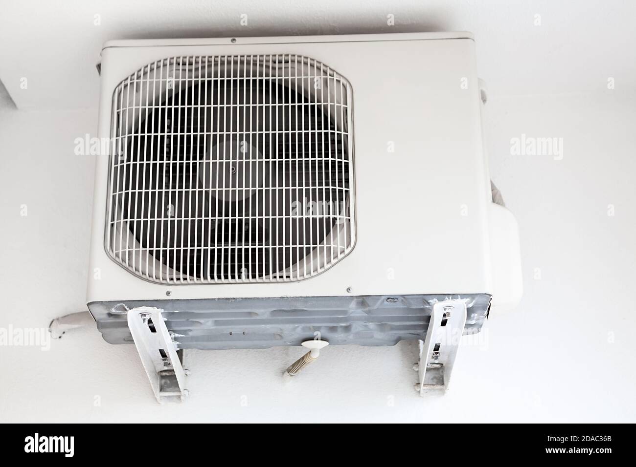 Split air conditioning system with external unit mounted in walls Stock ...