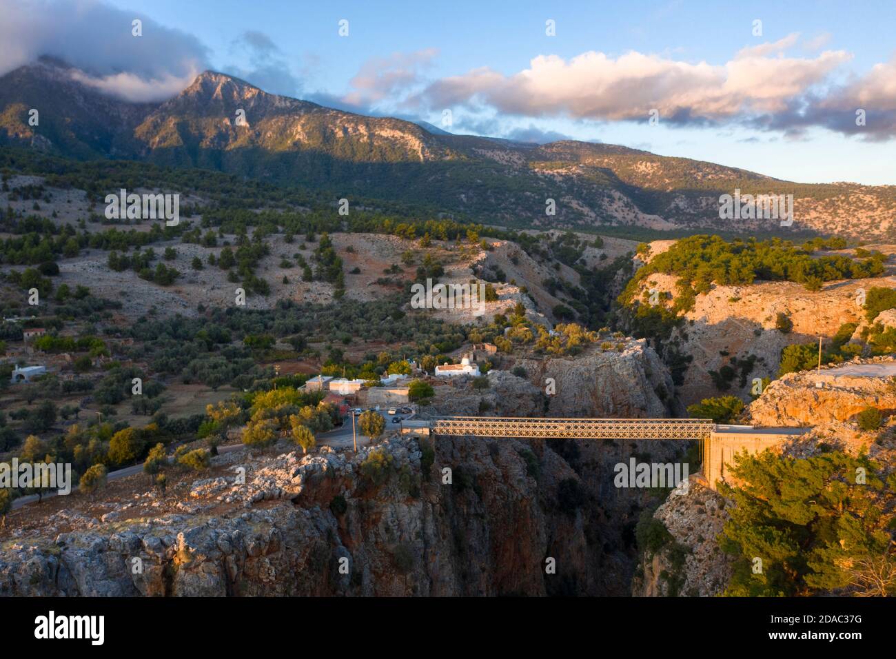Aerial view over Aradena Gorge at sunset showing Aradena Bridge, Hora ...