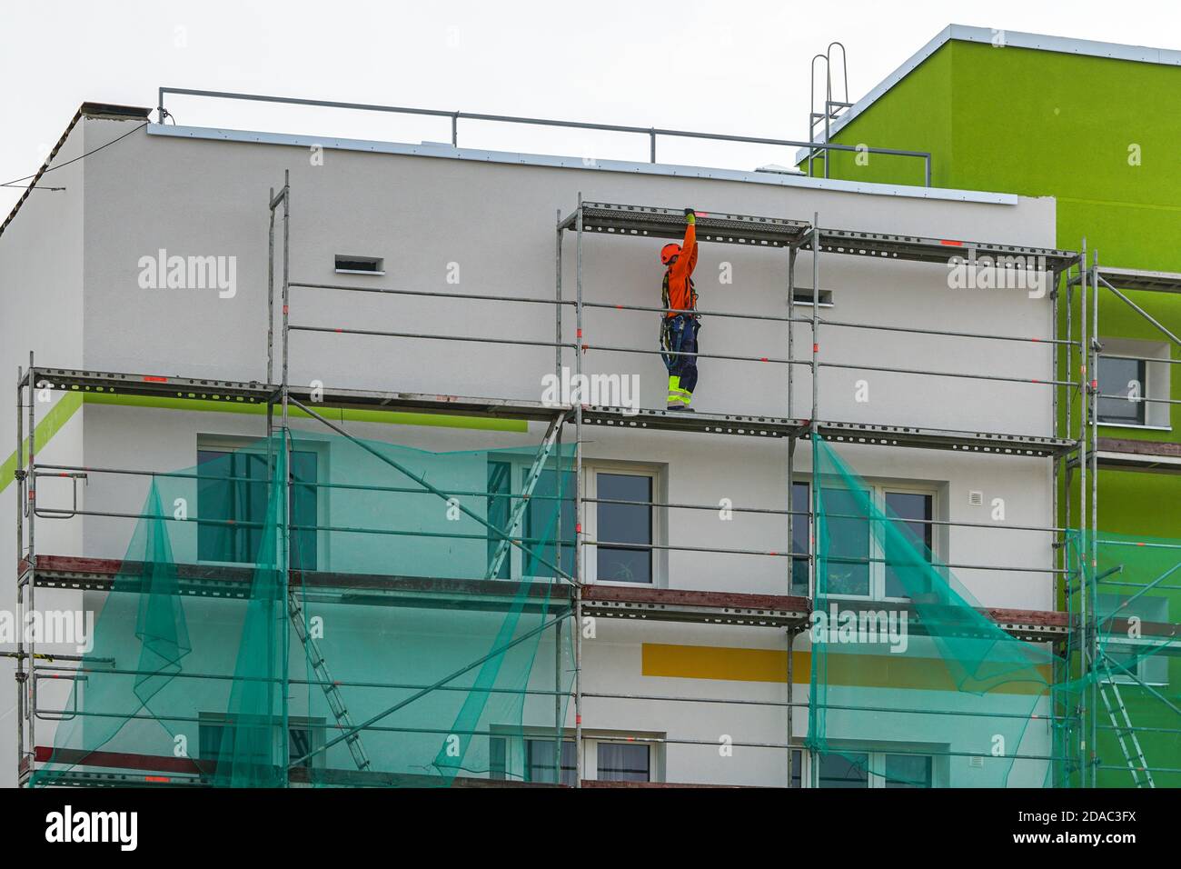 demolition of scaffolding after insulation and renovation of the ...