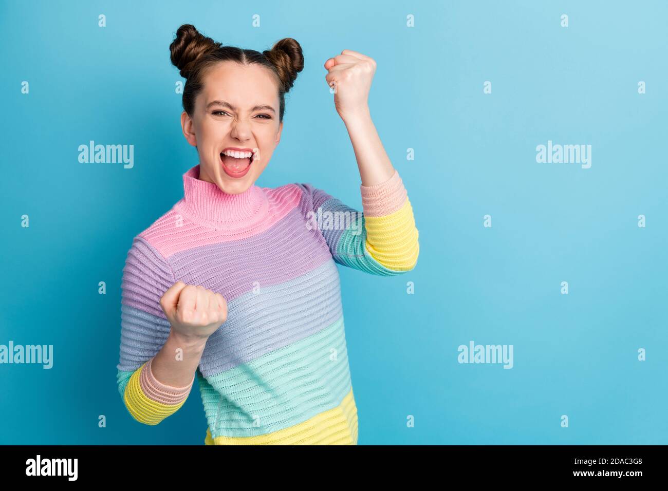 Photo of attractive crazy excited lady two buns good mood positive ...