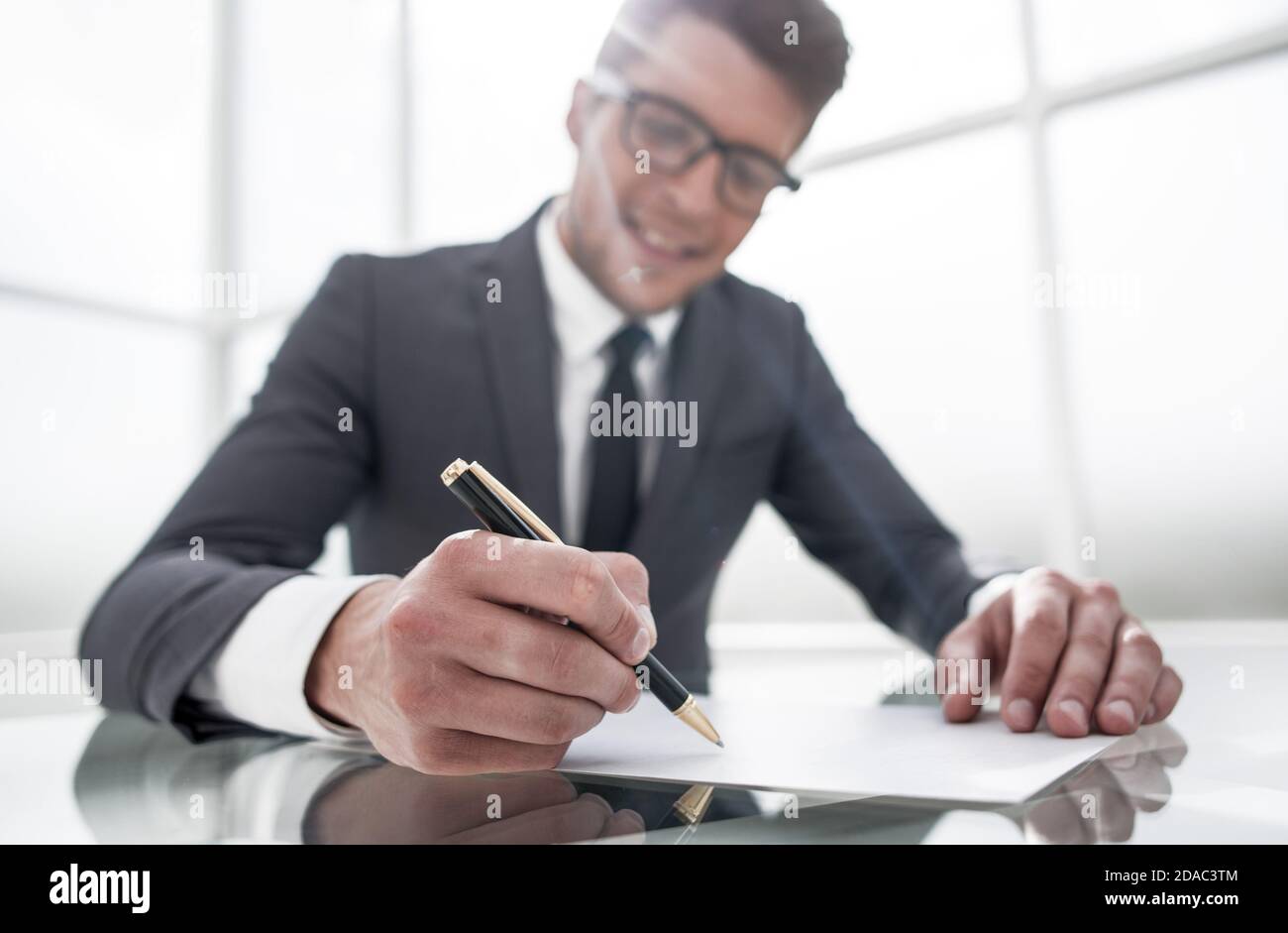 Man signing notary document signature hi-res stock photography and ...