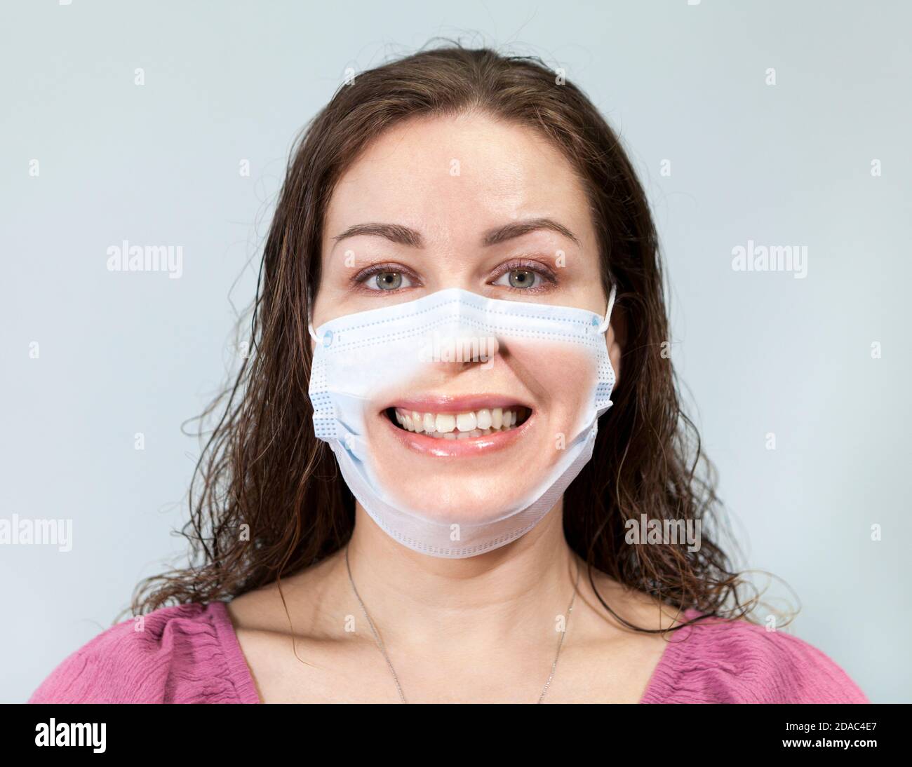 Uncertainty and embarrassment are on the face of an adult woman under ...