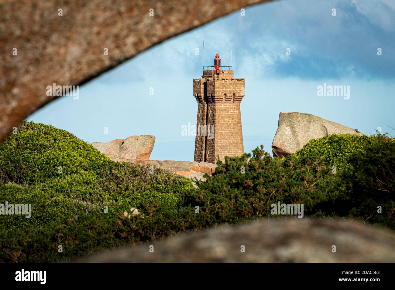 The pink granite lighthouse of Ploumanac'h (Brittany, France) stands in ...