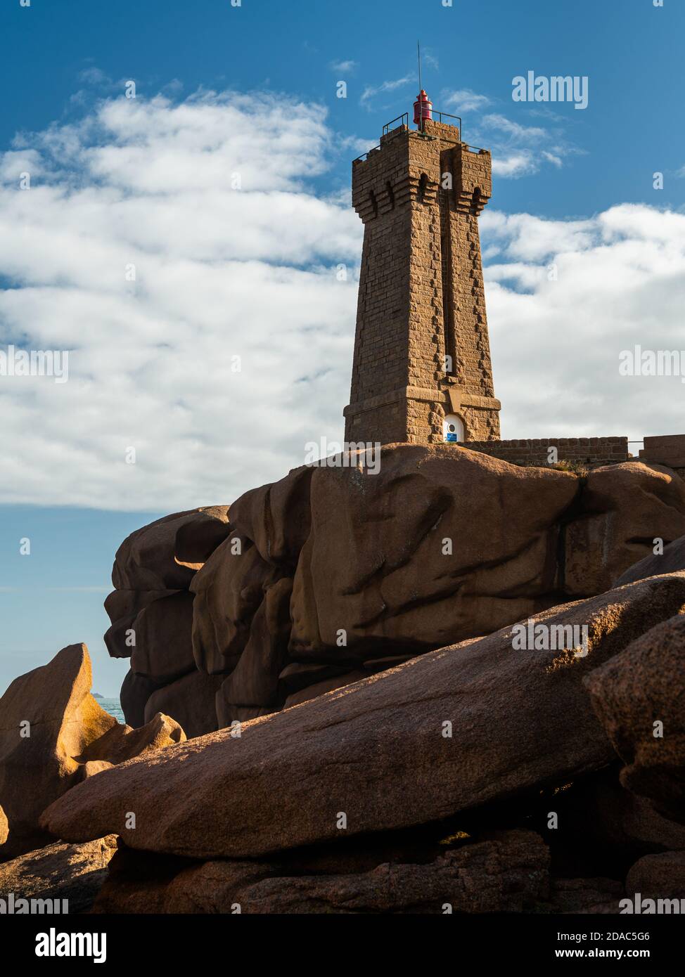 The pink granite lighthouse of Ploumanac'h (Brittany, France) stands in ...