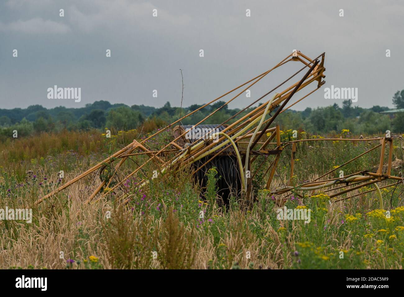 Rusty old farm equipment Stock Photo - Alamy